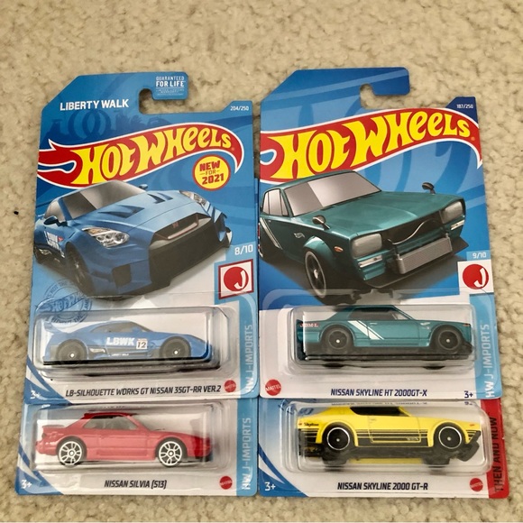 Mattel | Toys | Hot Wheels Nissan Set 4 | Poshmark